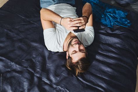 Man Typing On Cell Phone By Stocksy Contributor Lumina Stocksy