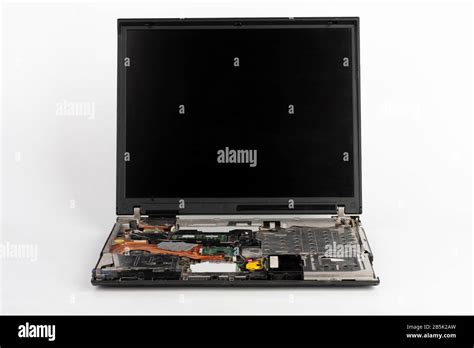 Laptop Removed Keyboard Hard Disk Drive CD Drive Battery Visible CPU Fan Main Board With