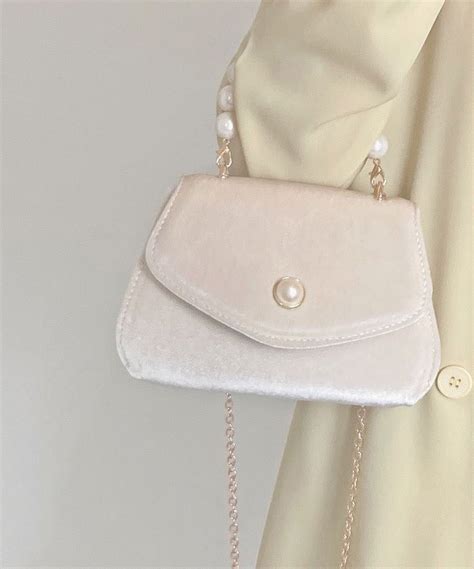 이쁨뽐뽐 진주미니백👛] 미닝 진주 스웨이드 벨벳 토트 크로스 체인 백 에이블리