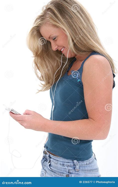 A Blonde Teen Girl Plugging Cables To Sensor Chips While Learning