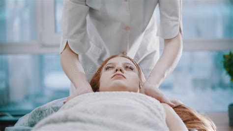 Massage Young Female Masseuse Is Holding A Massage With Her Beautiful