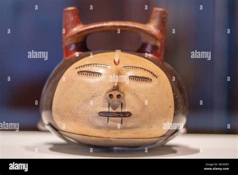 Glass With Double Spout And Bridge Handle Representing A Trophy Head