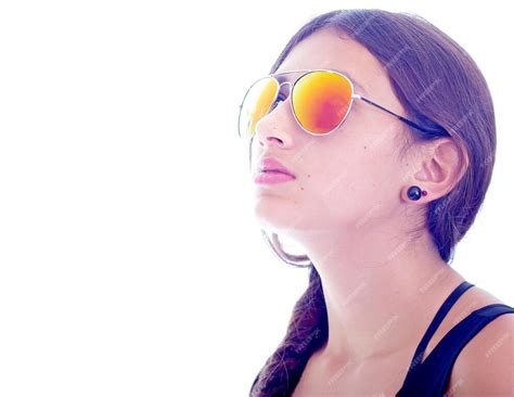 Premium Photo Teenage Girl Wearing Sunglasses Against White Background