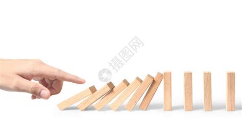 阻止多米诺效应的手被独特的商高清图片下载 正版图片503726541 摄图网