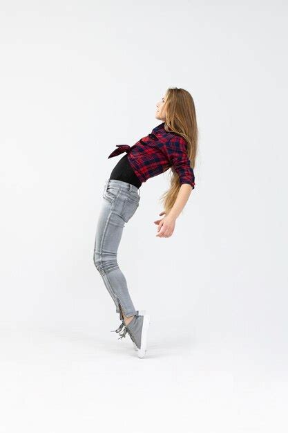 Premium Photo Model Performs Complicated Positions While Posing For A Photo