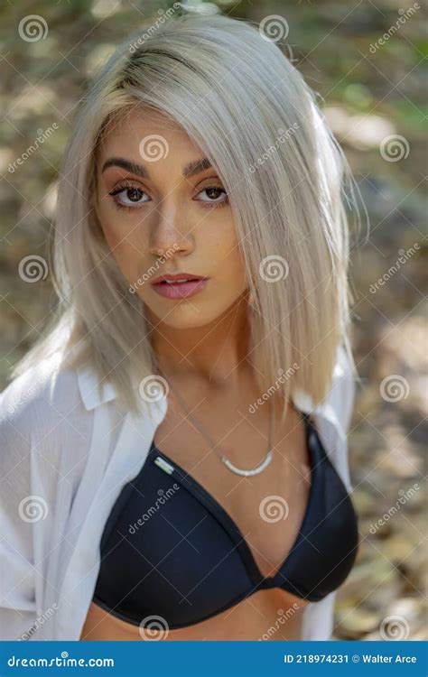 A Lovely Blonde Bikini Model Poses Outdoor While Enjoying A Summers Day Stock Image Image Of