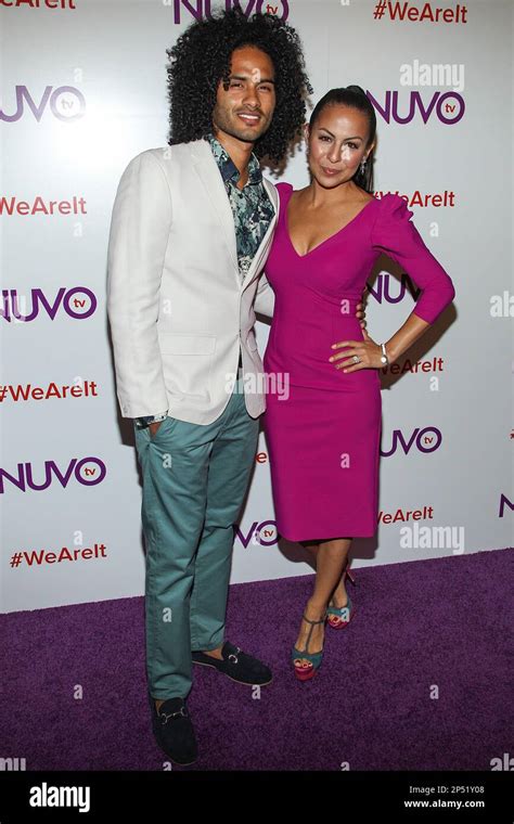 Actress Comdian Anjelah Johnson And Husband Manwell Reyes Attend The