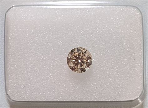 Diamant 032 Ct Rond Light Brown Si2 No Reserve Catawiki
