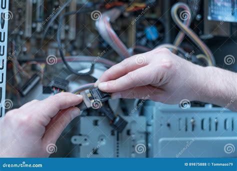 Professional Man Repairing And Assembling A Computer Stock Photo