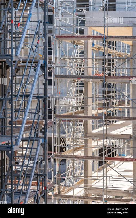 detail of facade of scaffolded multi storey building in shell with