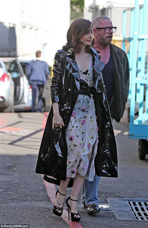 Lily Collins Steps Out In A Racy Pvc Mac As She Visits The Itv Studios Lily Collins Celebrity