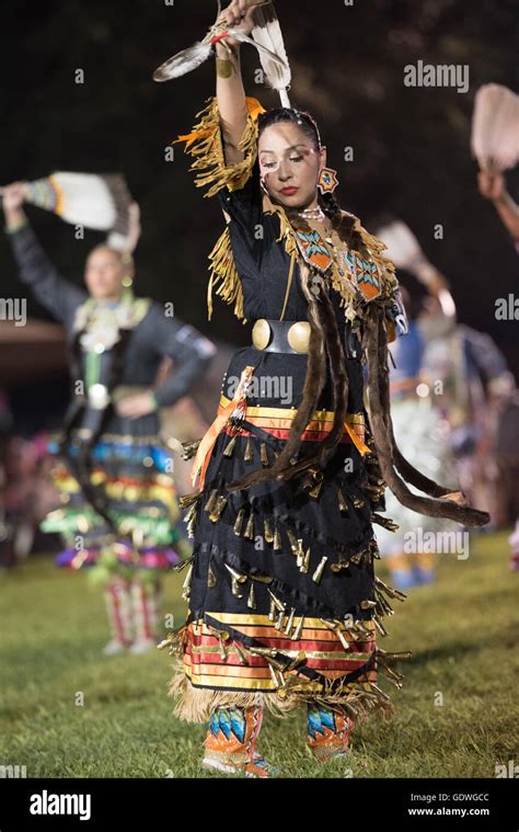 Native American Woman Performing Jingle Dress Dance During Sac And Fox