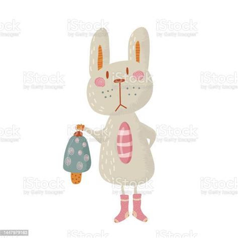 토끼는 크리스마스 장난감을 귀엽게 들고 있습니다 새해 선물과 함께 아름 다운 푹신한 토끼입니다 벡터 그림 0명에 대한 스톡 벡터 아트 및 기타 이미지 Istock