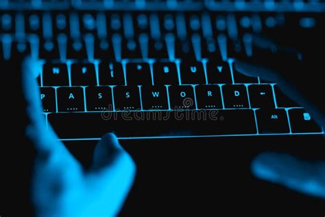 Hacker Typing On The Illuminated Keyboard By Night Stock Photo Image Of Criminal Identity
