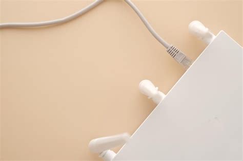 Premium Photo Wifi Router With Cables On Table