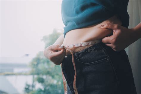 Fat Woman Fat Belly Chubby Obese Woman Hand Holding Excessive Belly Fat With Measure Tape