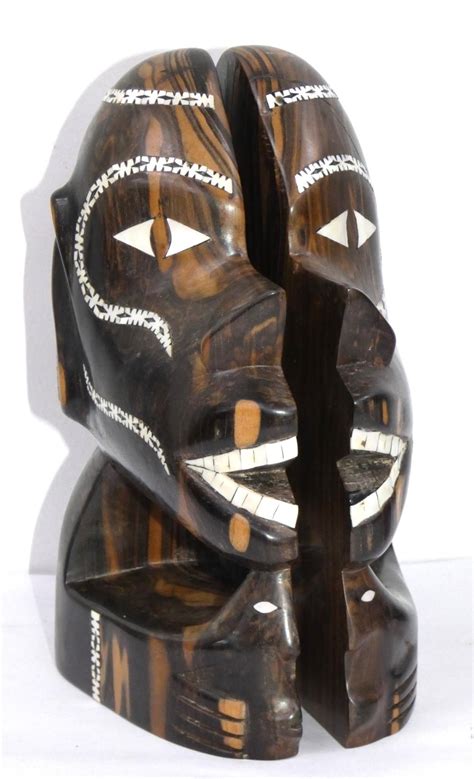 Lot A Full Carved Ebony Soloman Island Lot Bookends And Ornaments