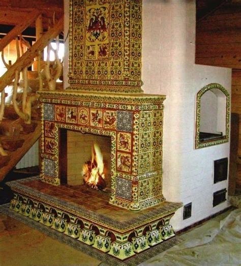 an ornate fireplace in the middle of a room