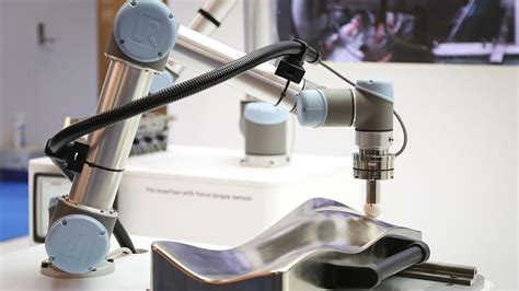 Universal Robots With ATIs F T Sensors Just Feels Right