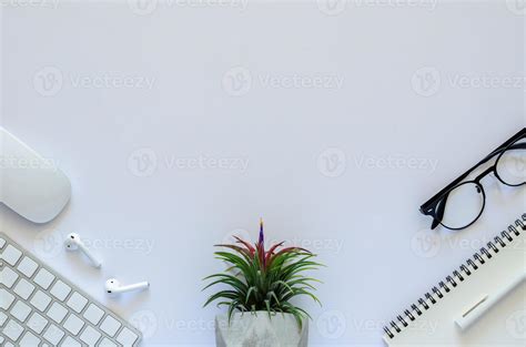 Background Of Work Space Concept With Air Plant Tillandsia Mouse Keyboard Earphone Notebook