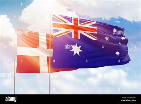 Sunny Blue Sky And Flags Of Australia And Denmark Stock Photo Alamy