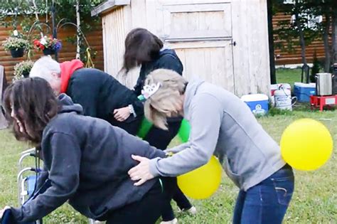 Watch As Grown Women Fall About Laughing In Funny Balloon Popping Race