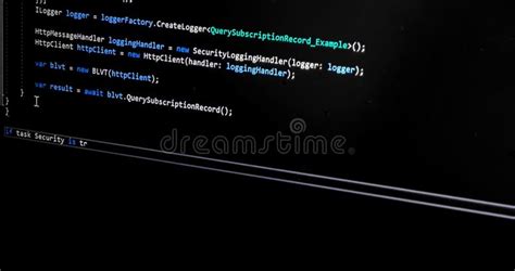 hacker programmer writes malicious code on laptop cyber security stock