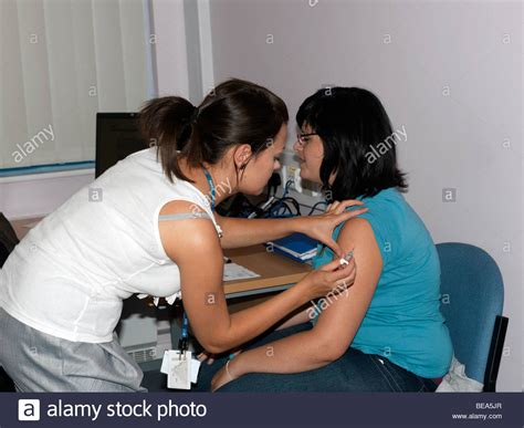 Teenager Having An Hpv Injection To Protect Against Cervical Cancer