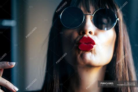 Attractive Female With Red Lips Kissing Clean Transparent Glass Passionately Lipstick