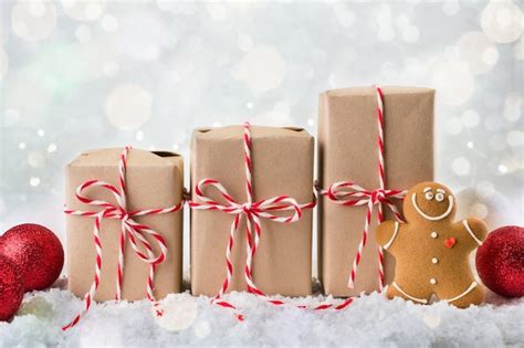 Premium Photo Brown Kraft Paper Parcel Tied With Red And White String