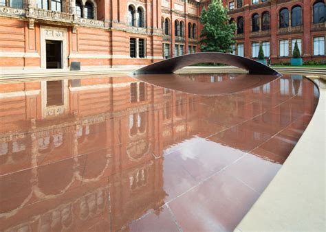 Zaha Hadid Installs Aluminium Wave Over Pool In Vanda Museum Garden