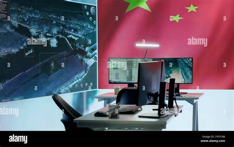 Empty Monitoring Room Equipped With The Chinese Flag On Big Screen Using Surveillance Satellite