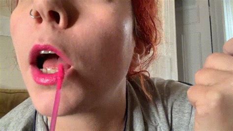 Putting On Three Shades Of Shiny Pink Lipstick Lip Puckering And