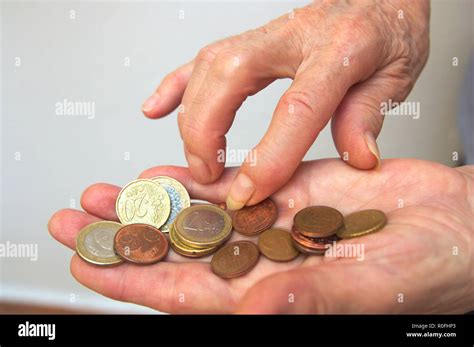 Beggar Counting Coins Hi Res Stock Photography And Images Alamy