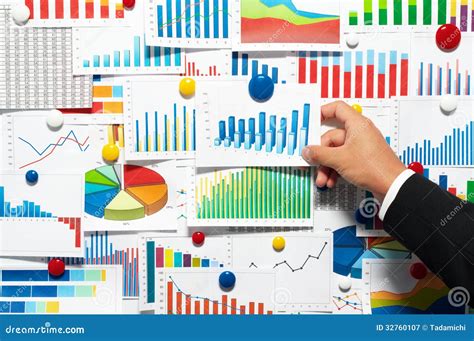 Businessman Choosing From A Variety Of Graphs Stock Image Image Of
