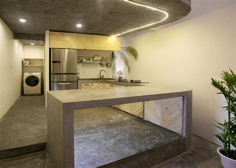 Perforated Brick Gable Screens Courtyard In Front Of Compact Hanoi House