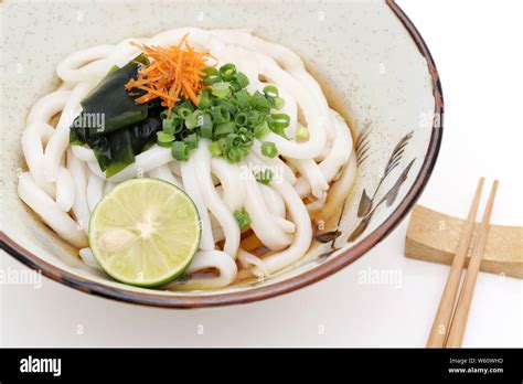 Japanese Bukkake Udon Noodles In A Ceramic Bowl On White Background