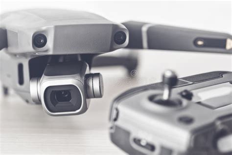 Quadcopter Drone With Its Remote Control Showcasing Advanced