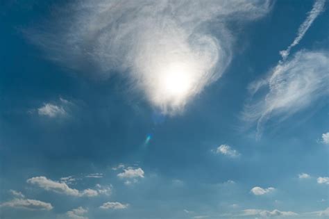 Premium Photo Beautiful Fluffy Clouds In The Evening Sky The Sunlight