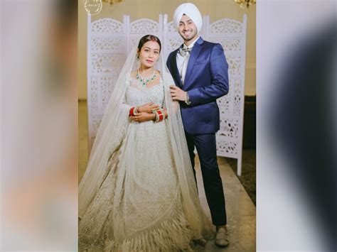 Neha Kakkars Silver Lehenga From Her Wedding Reception