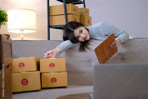 Babe Beautiful Asian Woman Sitting On Sofa In Front Of Laptop Sleepy