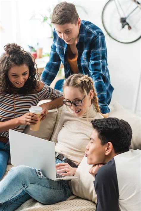 Group Of Multicultural Teens Looking At Laptop Stock Image Image Of