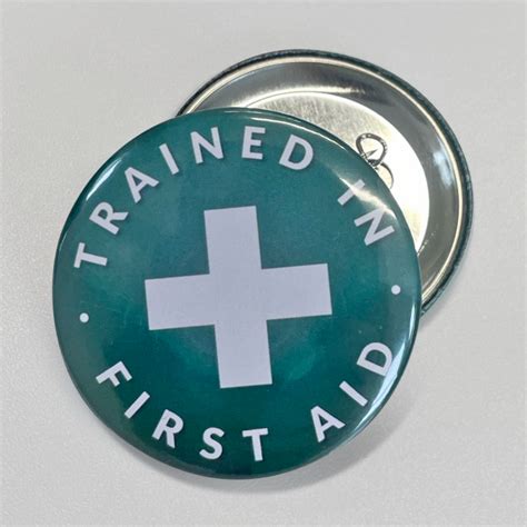 First Aider Pin Badge Nuco Plus