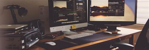 Desktop Workspace With Dual Monitors And Design Software Premium Ai