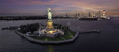Aerial View Of The Illuminated Statue Of Liberty On The Night Stock
