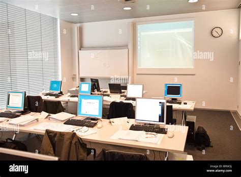 Computers On Tables In A Classroom Stock Photo Alamy