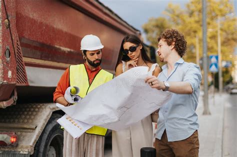 Collaborative Urban Project Planning Architects And Engineers Discussing Sustainable Design And