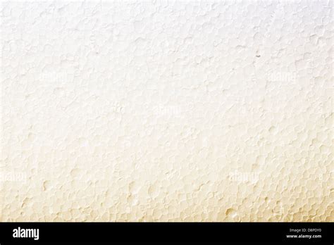 Background Texture Of White Yellow Polystyrene Material Foam Stock