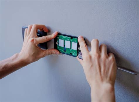 Technician Installing Sensor Light Switch At Modern Villa Stock Photo Image Of Renovating