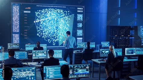 Team Of Professional Computer Data Science Engineers Work On Desktops